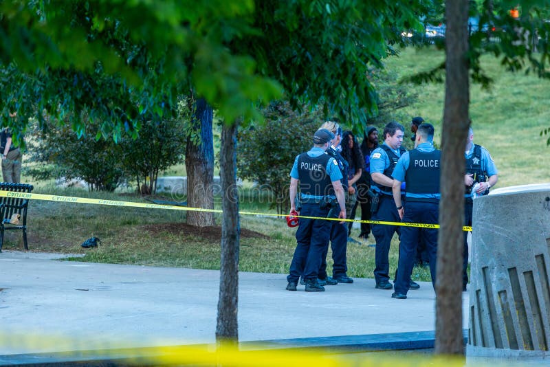 Caution Tape Wrapped Around Tree Blocking Access To a Crime Scene that ...