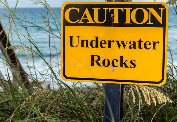 Caution Underwater Rocks stock image. Image of sign, danger - 41188971