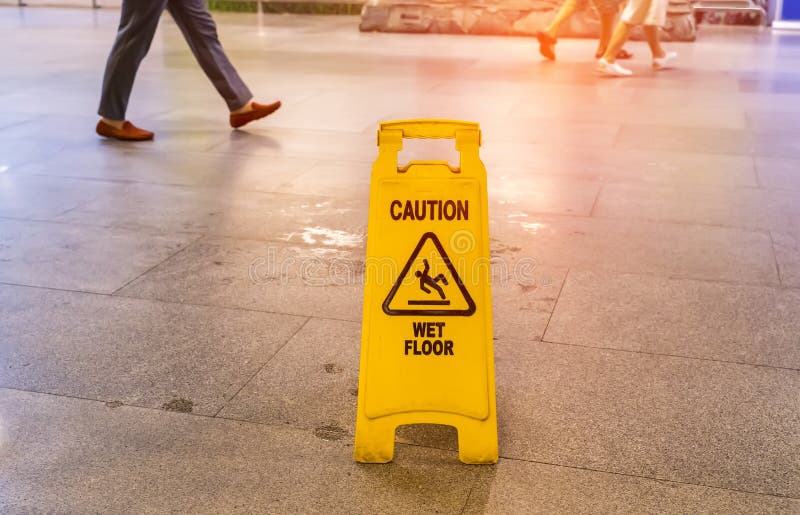 `Caution wet floor` sign stock image. Image of hurt - 181845415