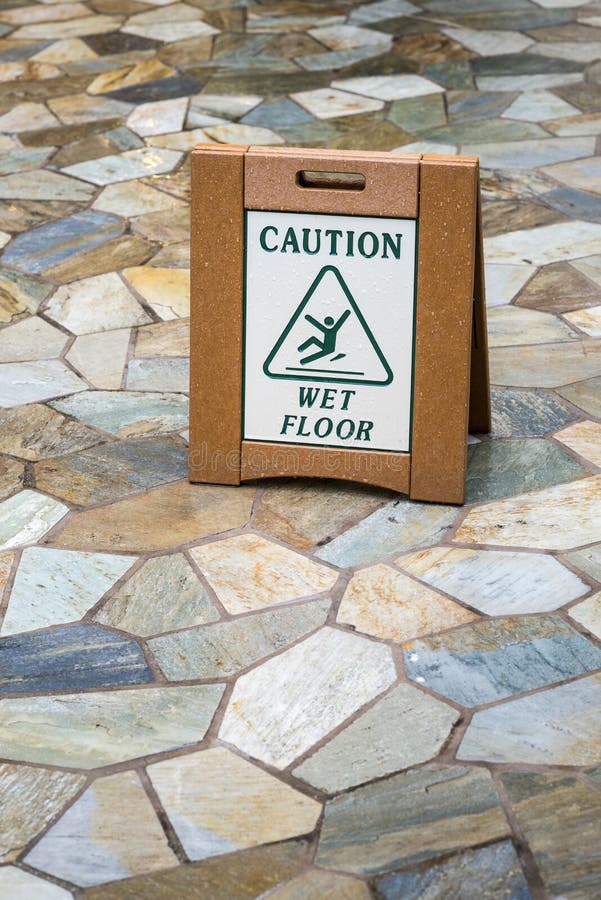 Caution Wet Floot stock image. Image of interior, injury - 47871911