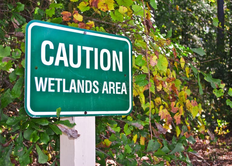 Caution Wetlands Area Sign stock image. Image of sign - 6935675