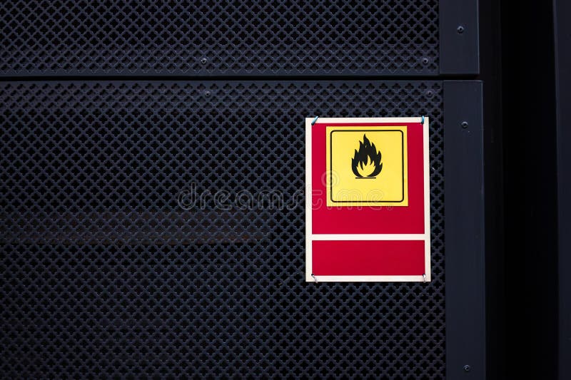Cautionary Fire Warning Sign on a Black Metallic Grill Stock Photo ...
