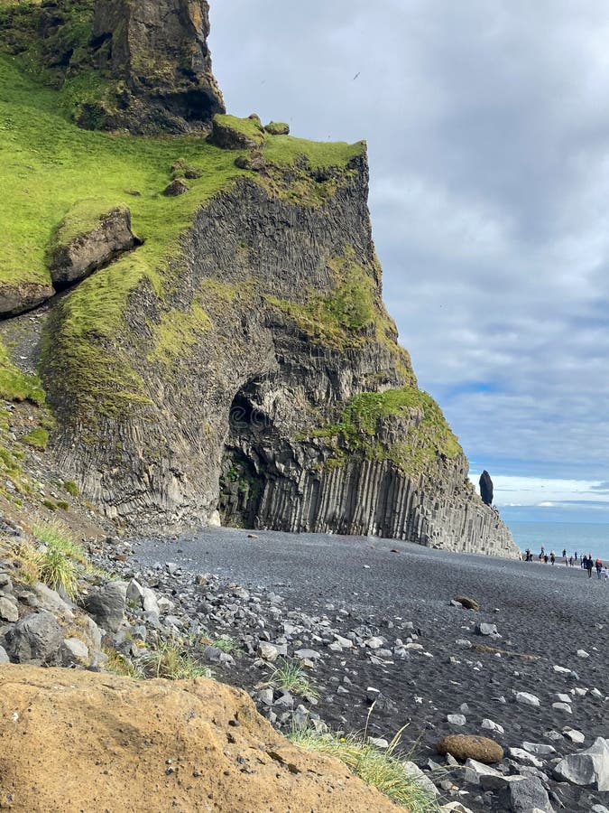 A Cave with Basalt Columns on a Beach in Iceland Stock Photo - Image of ...