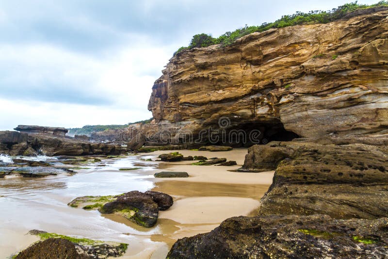 Cave on a Beach stock image. Image of scenic, paradise - 94543253