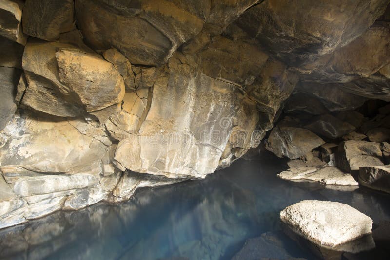 Cave and Calm Water with Reflections Stock Image - Image of rockpool ...