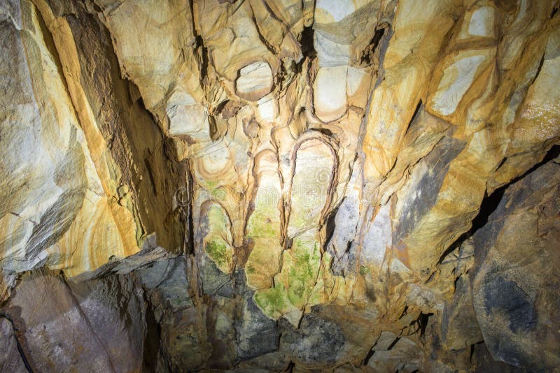 The Cave in the Cliff Close-up Stock Photo - Image of hole, beautiful ...