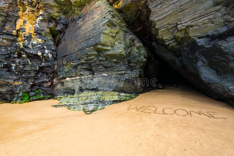 Welcome cave stock image. Image of geology, quality - 244700945