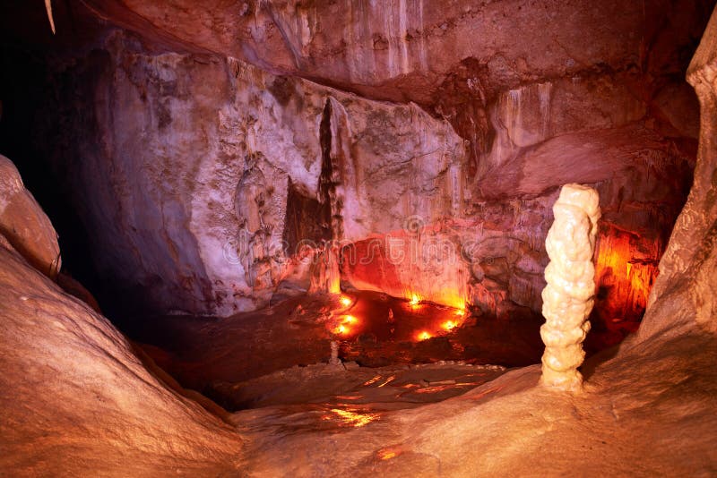 Cave Dark Interior with Light, Stalactites and Stalagmites Stock Image ...