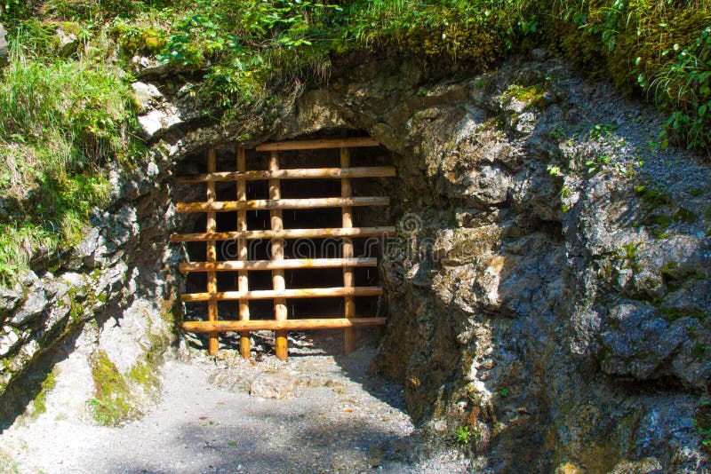 Cave entrance stock image. Image of forest, outdoors - 62217593