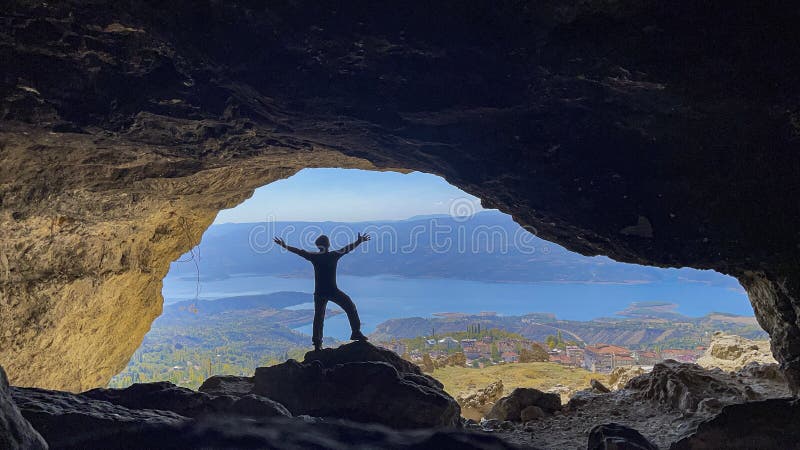 Cave Expedition in Mountains and Person Enjoying Life Stock Photo ...