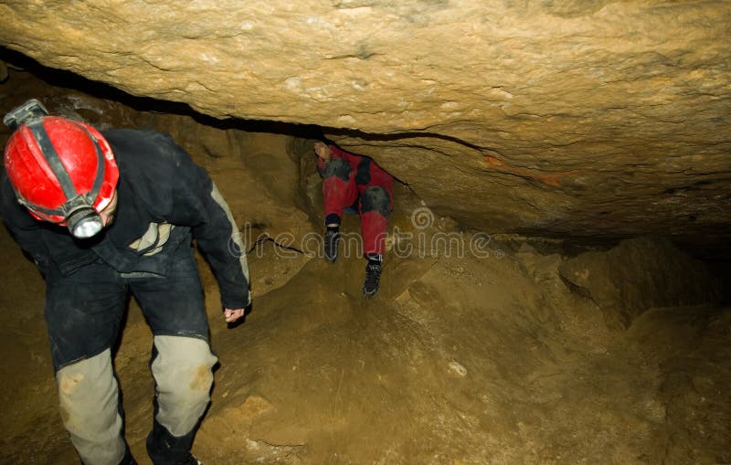 Cave Exploration With Helmet And Headlight Stock Photo - Image of caver ...