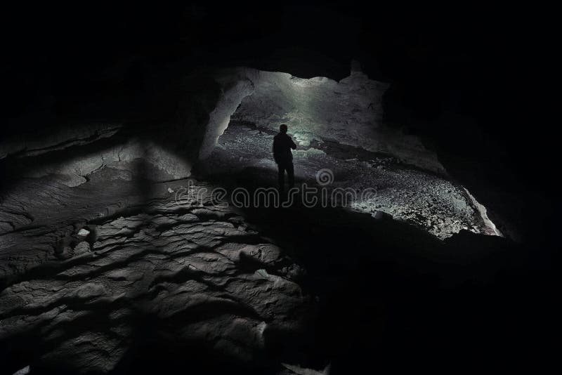 Cave Exploration with Helmet and Headlight Stock Photo - Image of caver ...