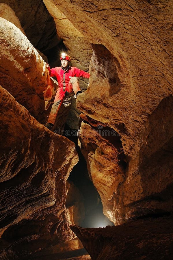 Cave explorer in action stock photo. Image of meander - 17536716