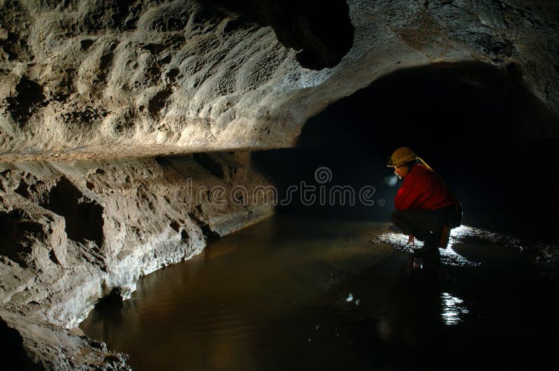 Cave explorer in action stock photo. Image of meander - 17536716