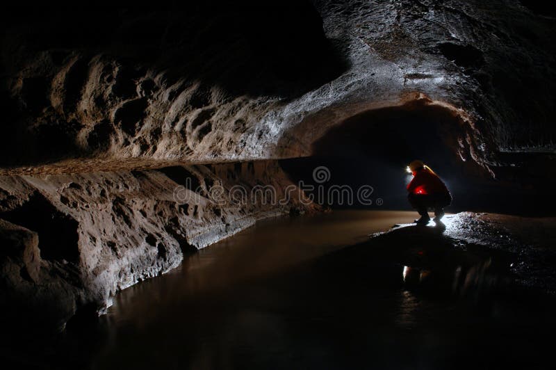 Cave explorer in action stock photo. Image of meander - 17536716