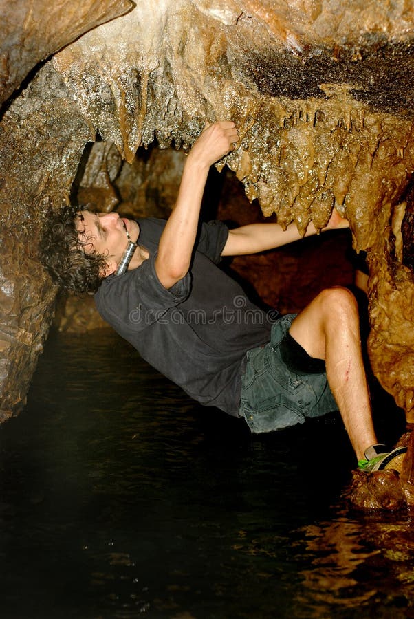 Cave exploring stock photo. Image of claustrophobia, explore - 34767442