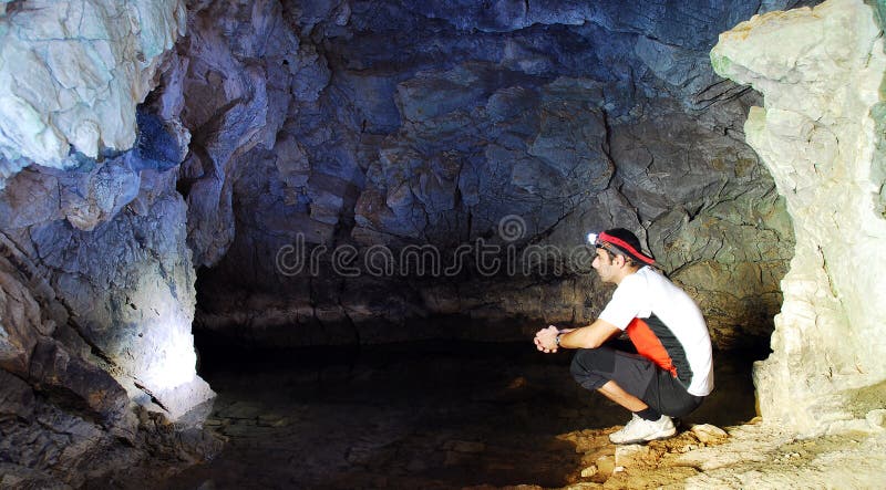 Cave exploring stock photo. Image of claustrophobia, explore - 34767442