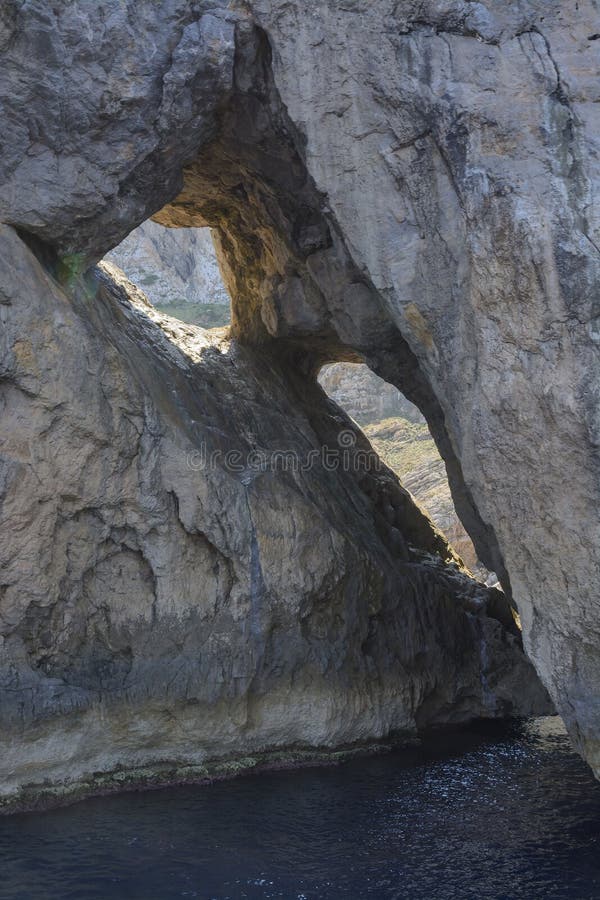 Cave Eyes Create Old Man Face in Mountain Stock Image - Image of ...