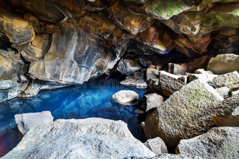 A Cave Filled with Hot Water in Iceland. Stock Photo - Image of amazing ...