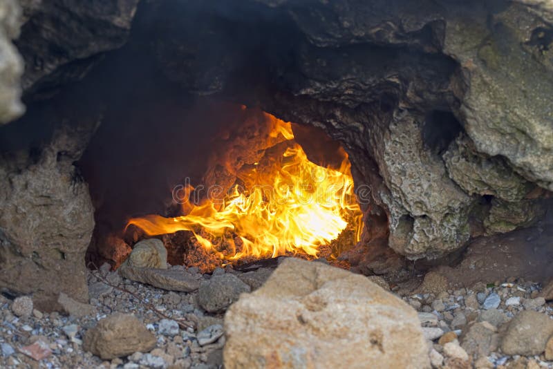 Cave with fire stock photo. Image of fireplace, heat - 88696912