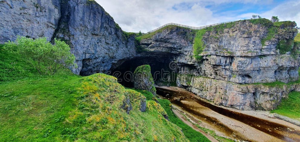 Cave Inside a Cliff in Greenery Stock Photo - Image of natural, rock ...