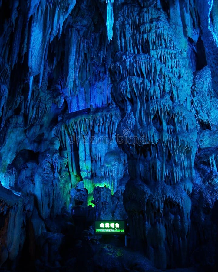 Cave Interior with Blue Light Stock Image - Image of stalacmite, roots ...