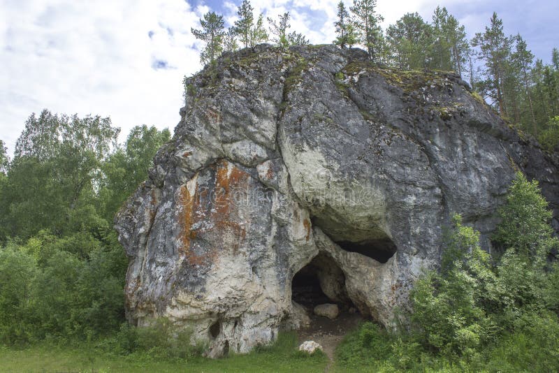 Cave in the Rock Coming Out of the Ground Stock Image - Image of shadow ...
