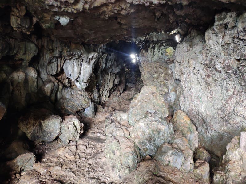 Exploring the Enchanting Cave S Natural Illumination Amid Majestic ...