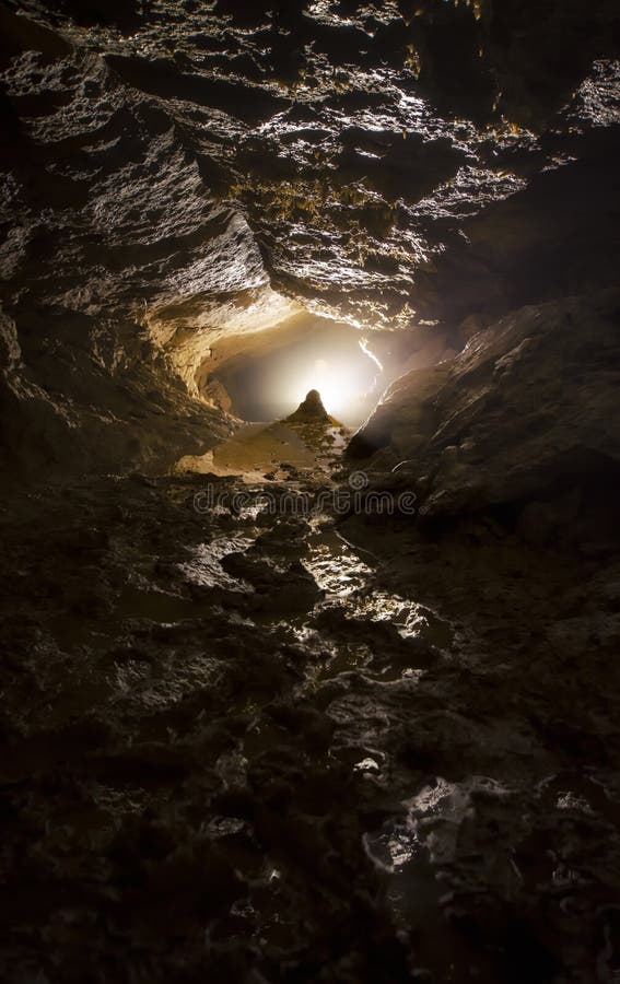 Cave with Light and Stalagmite Stock Image - Image of entrance ...