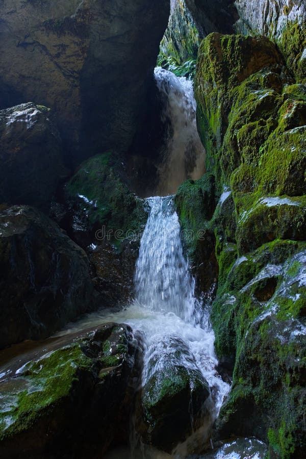 Cave river and waterfall stock photo. Image of cave - 203049306