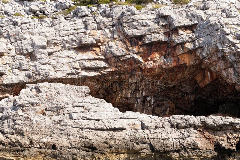 Cave in the rock stock photo. Image of rock, looking - 61325212