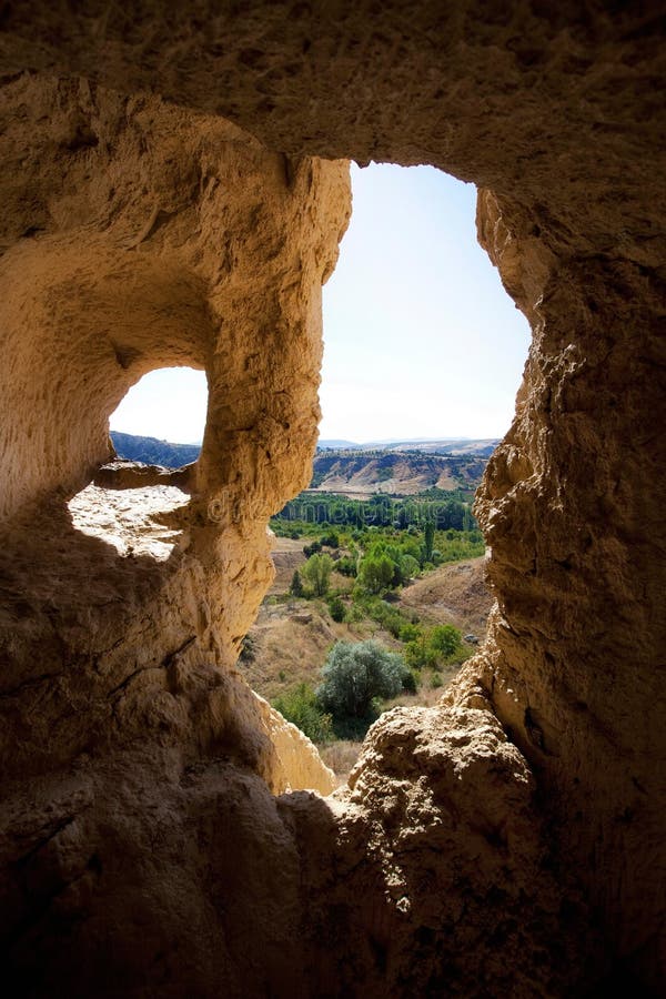 Cave exit stock photo. Image of round, clouds, entrance - 1319460