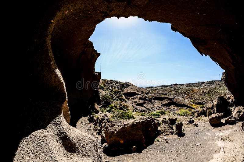 A Cave with a Small Opening in the Ceiling Stock Image - Image of ...