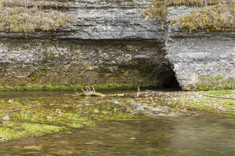 Cave in Spring stock image. Image of stone, landscape - 54478589