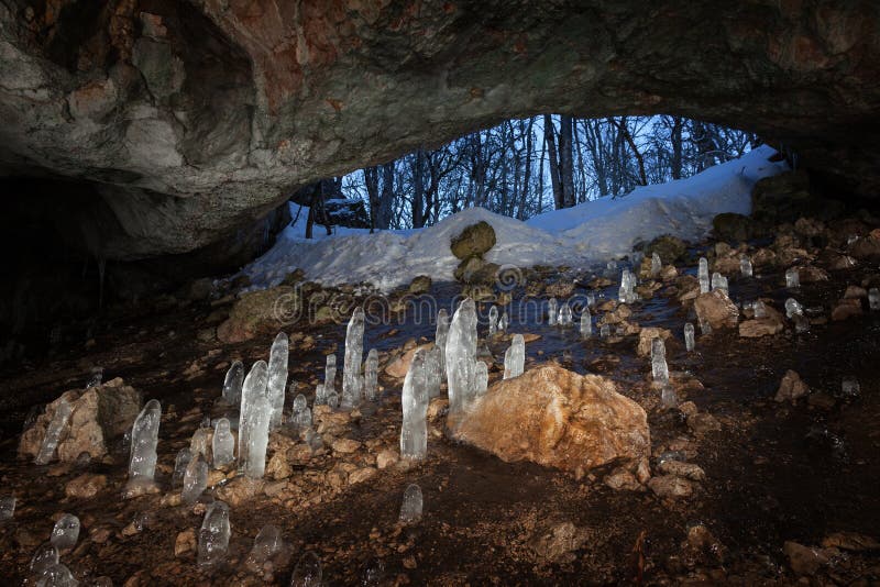 Cave with Stalagmites of Ice Stock Image - Image of speleology, geology ...