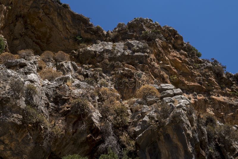 Cave on Steep Slope of a Mountains at Rhodes Island Stock Image - Image ...