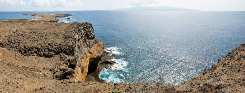 Cave under cliff stock photo. Image of clouds, cave, archipelago - 58462642