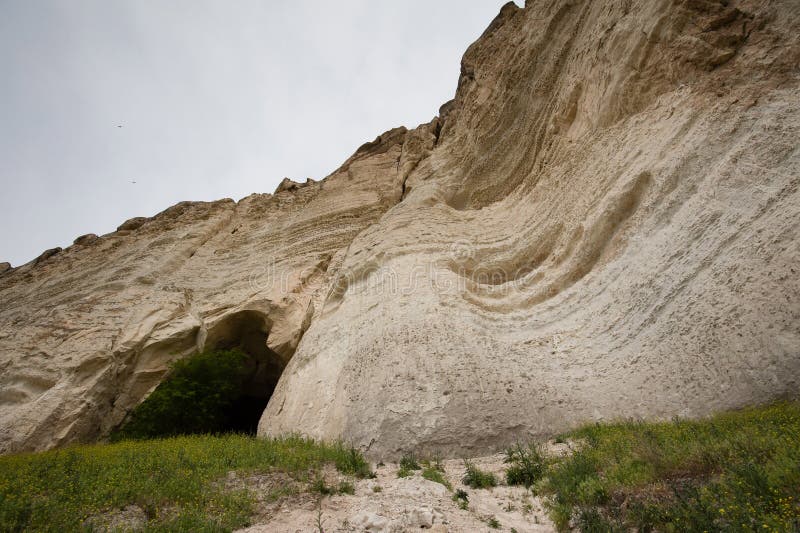 Cave in white rock stock image. Image of skyes, cave - 34604361