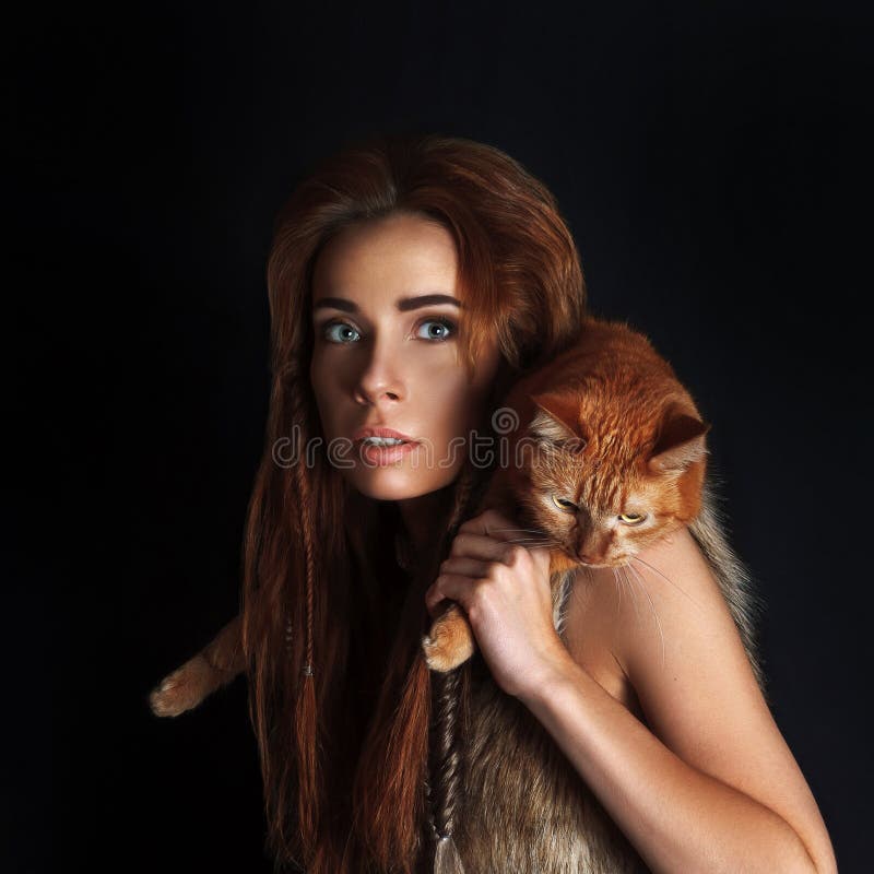 Caveman girl and red cat stock photo. Image of caucasian - 60023956