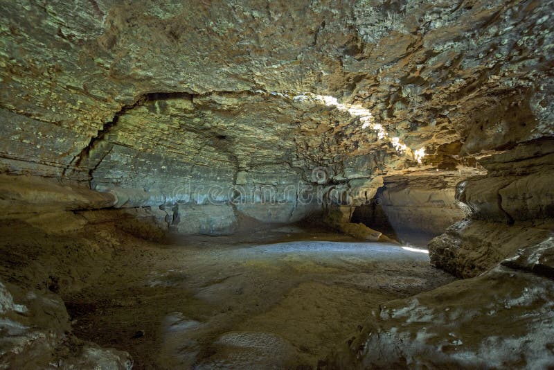 Cavern with Natural Light from Overhead Crack Stock Photo - Image of ...