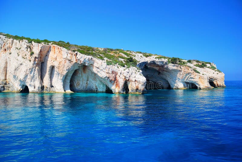 Cavernous Rock and Sea stock image. Image of indigo, europe - 24061537