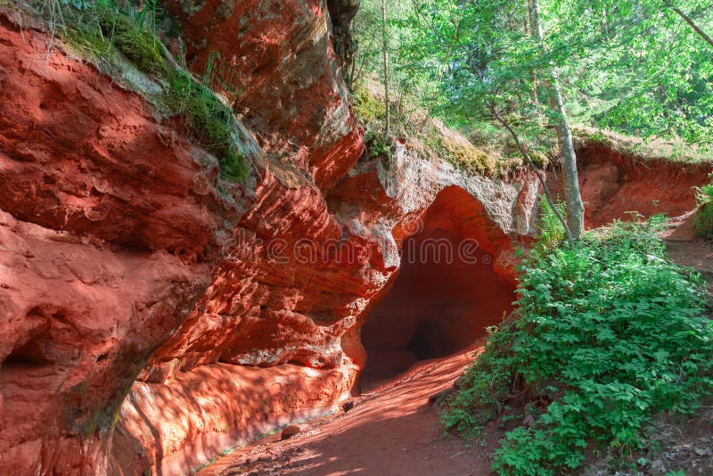 Caves in the red rocks stock photo. Image of landscape - 246044066