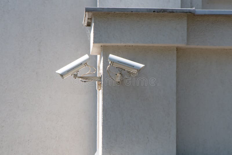 CCTV Camera Attached on the Wall of the Building, Monitoring and ...