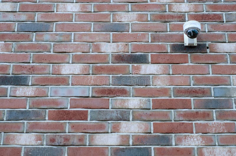 CCTV Camera on a Brick Wall Stock Photo - Image of defense, exterior ...