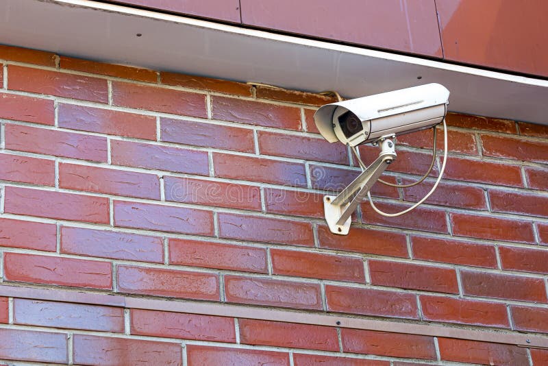 CCTV Camera on a Brick Wall. Surveillance, Security and Safety Concept ...