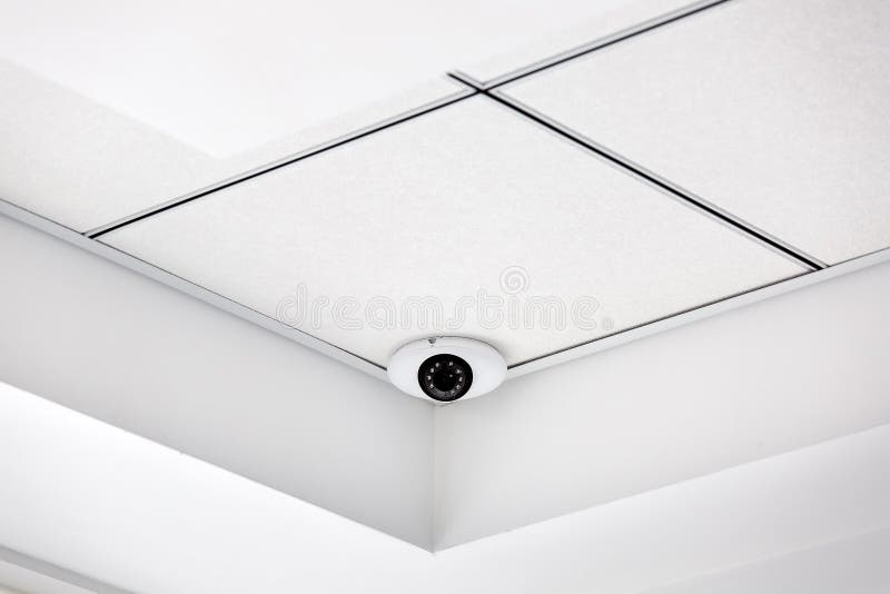 CCTV Camera in the Corner on a White Suspended Ceiling. Stock Image ...