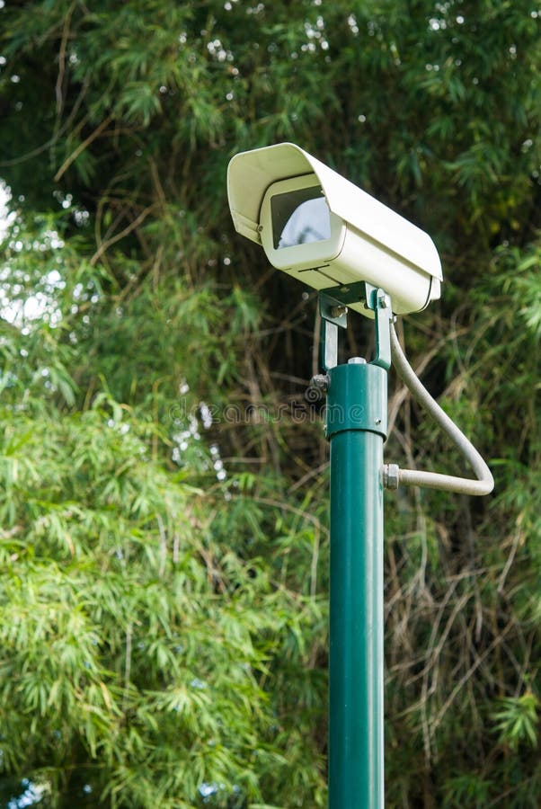 CCTV Camera on Green Pole Stand in the Park Stock Image - Image of ...