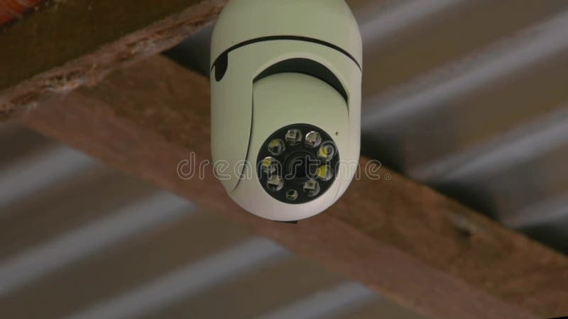 A CCTV Camera Installed on the Street Moves and Monitors Security Stock ...