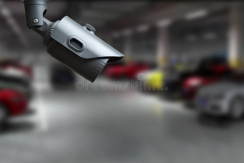 CCTV Camera Operating in Car Park Building. Copy Space. Stock Image ...