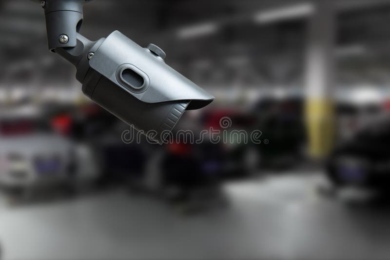 CCTV Camera Operating in Car Park Building. Copy Space. Stock Image ...